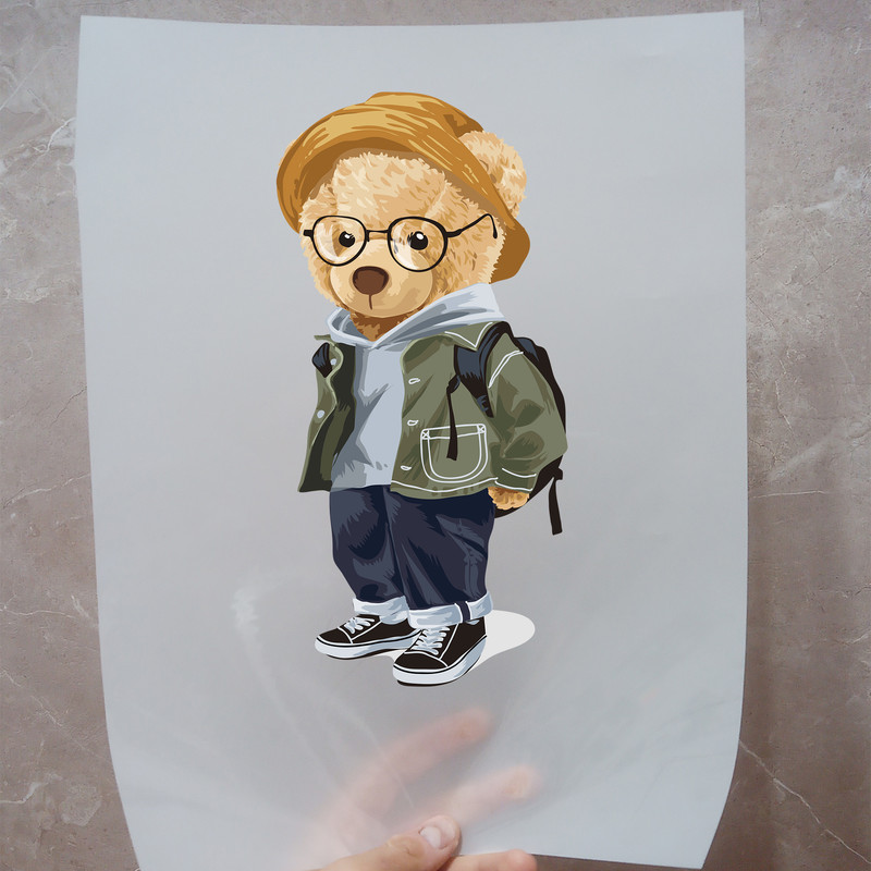 قیمت و خرید استیکر پارچه و لباس مدل dtf طرح تدی کد H15.115 مجموعه 12 عددی