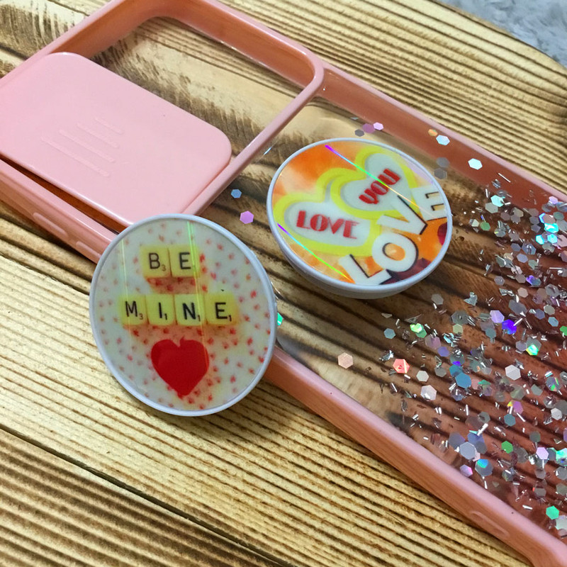 قیمت و خرید پایه نگهدارنده گوشی موبایل پاپ سوکت مدل لیزری کد P69 مجموعه دو عددی