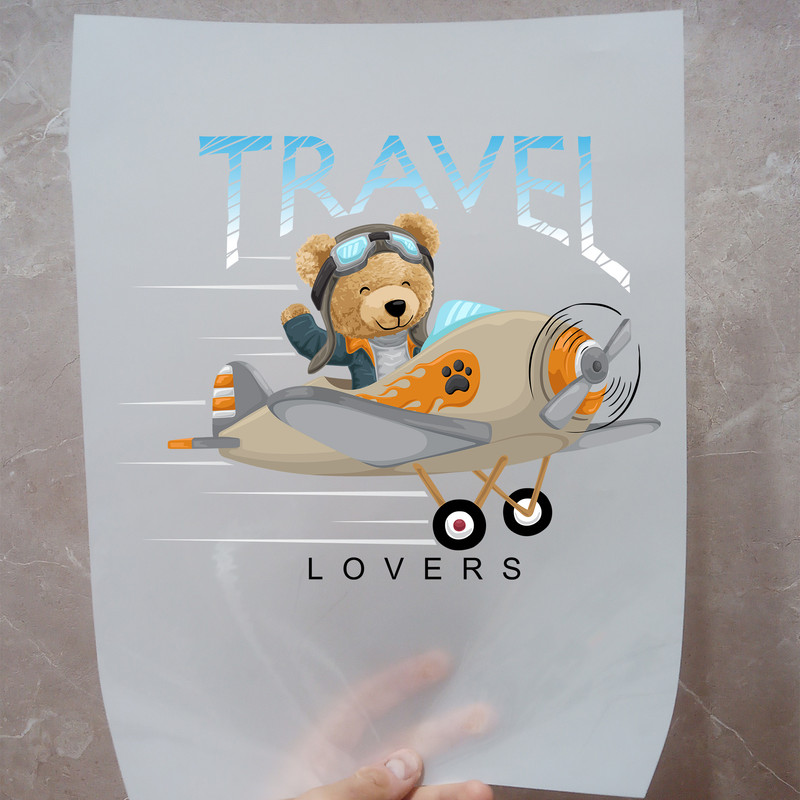 قیمت و خرید استیکر پارچه و لباس مدل dtf طرح تدی کد H15.49 مجموعه 12 عددی